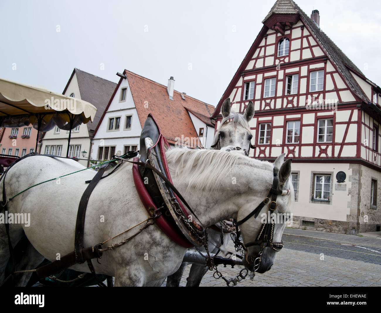Horse Carriage and Frame Houses Stock Photo - Alamy