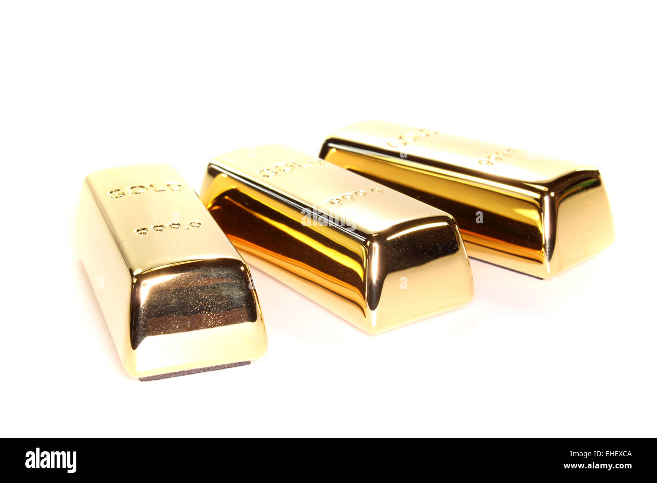 three gold bars Stock Photo - Alamy