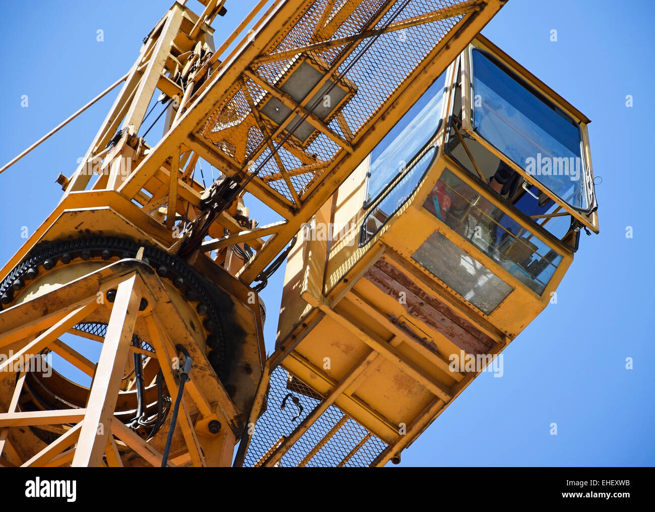 Cabin of the tower crane from below Stock Photo - Alamy