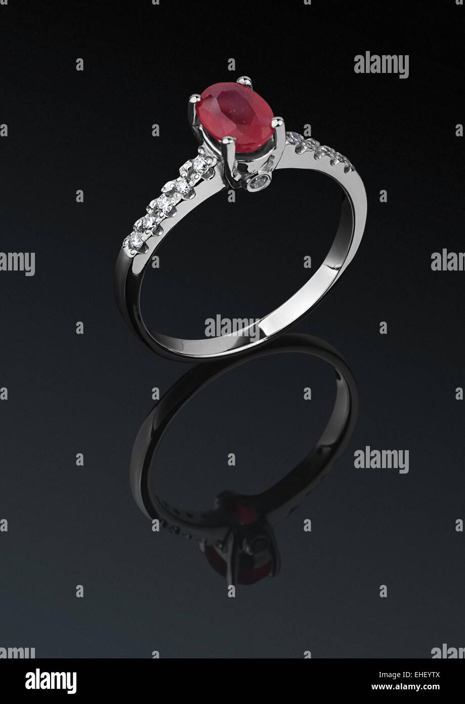 Ring with diamonds on dark background Stock Photo - Alamy