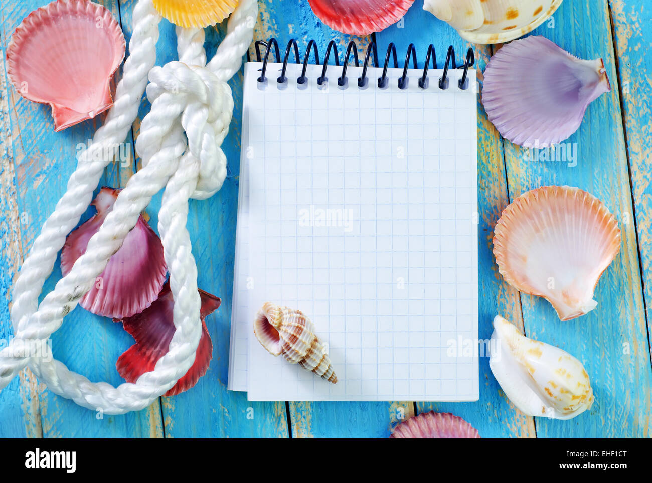 note and sea shell Stock Photo - Alamy
