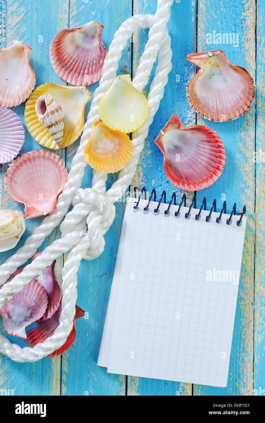 note and sea shell Stock Photo - Alamy