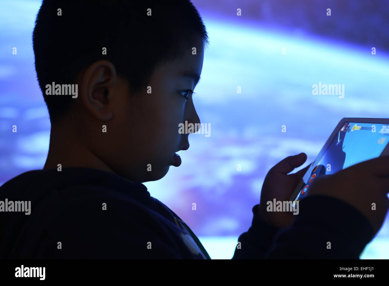 Child using computer silhouette hi-res stock photography and images - Alamy
