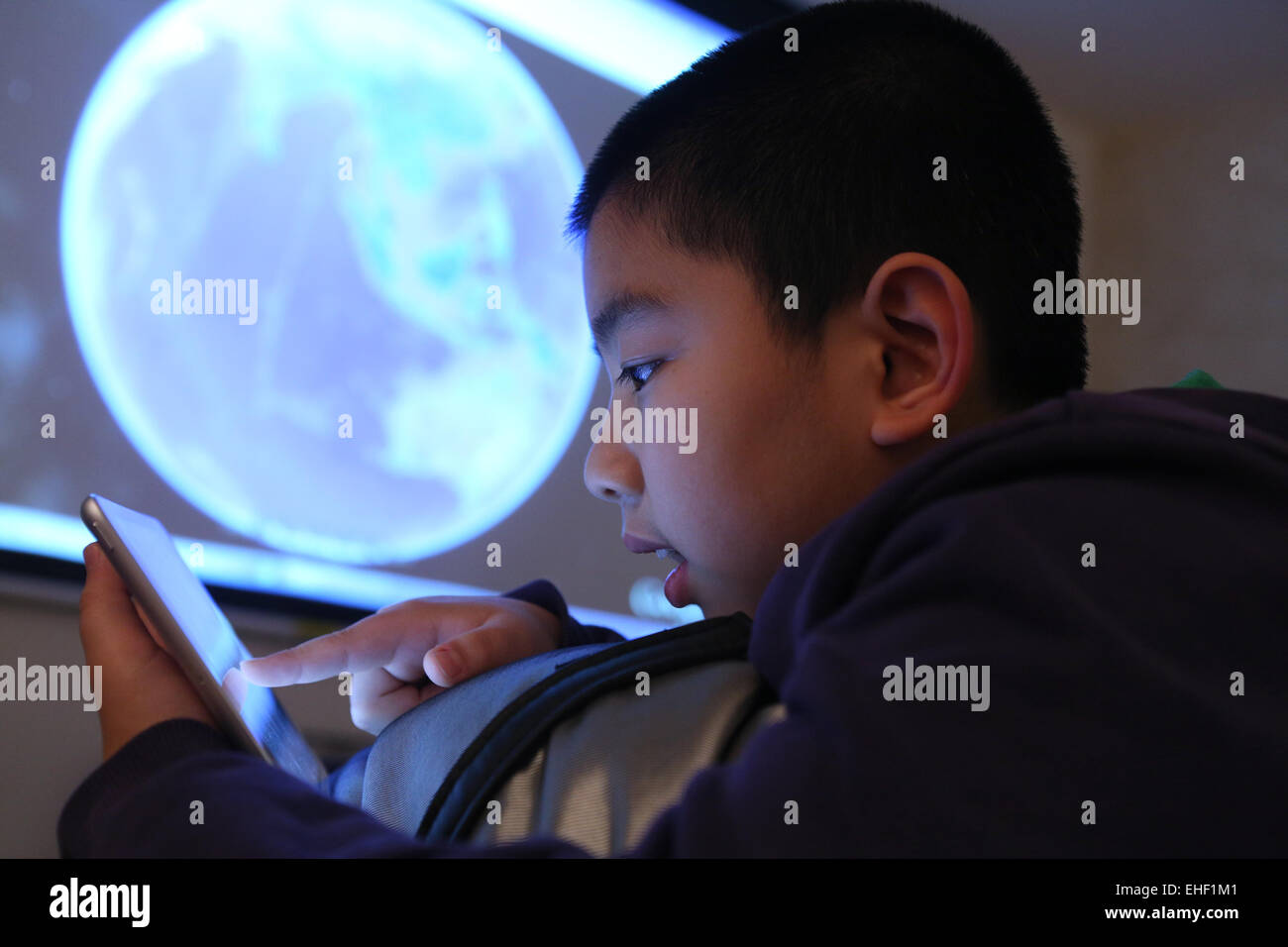Boy touching tv screen hi-res stock photography and images - Alamy