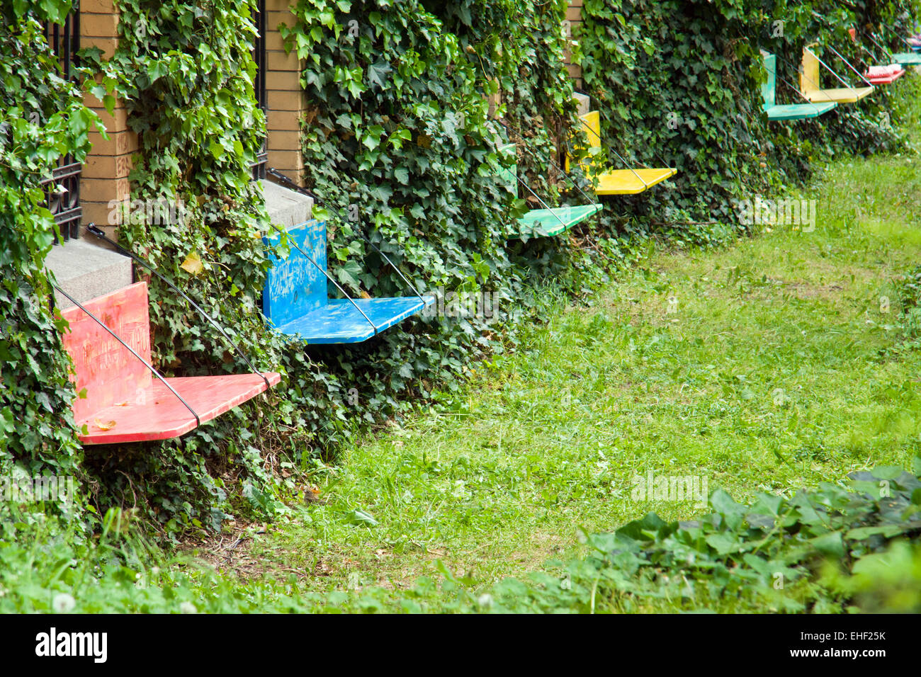 Colourful park benches Stock Photo - Alamy