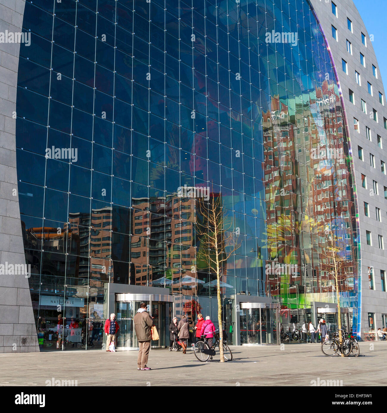 ROTTERDAM, NETHERLANDS - FEBRUARY 19, 2015: Apartments reflecting in ...