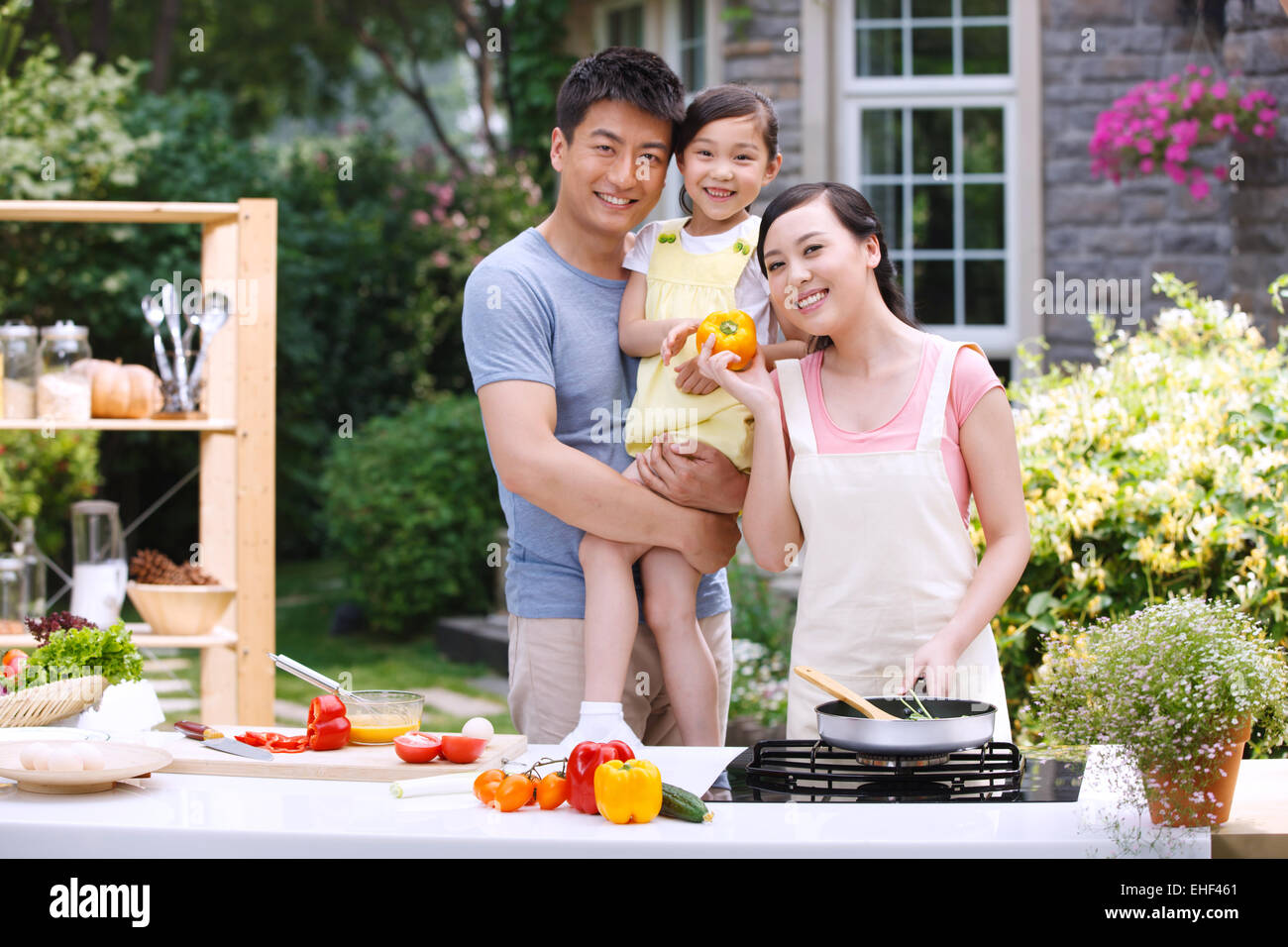 Family eating outdoor tomato hi-res stock photography and images - Alamy