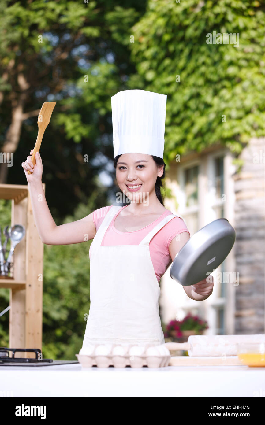 Asian chef cooking in outdoor hi-res stock photography and images - Alamy