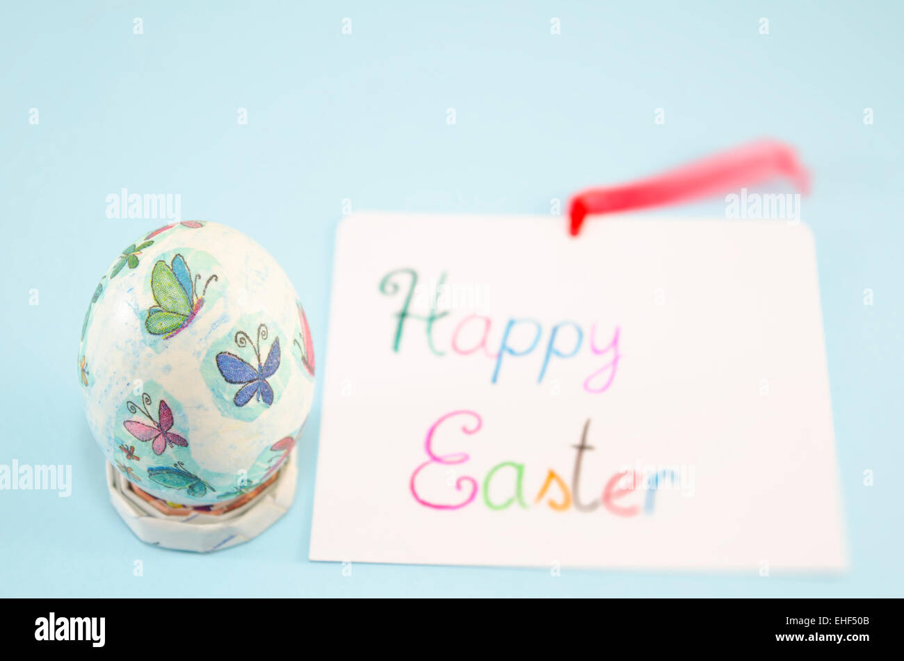 Hand painted decoupage Easter egg with butterfly pattern, and a Happy ...