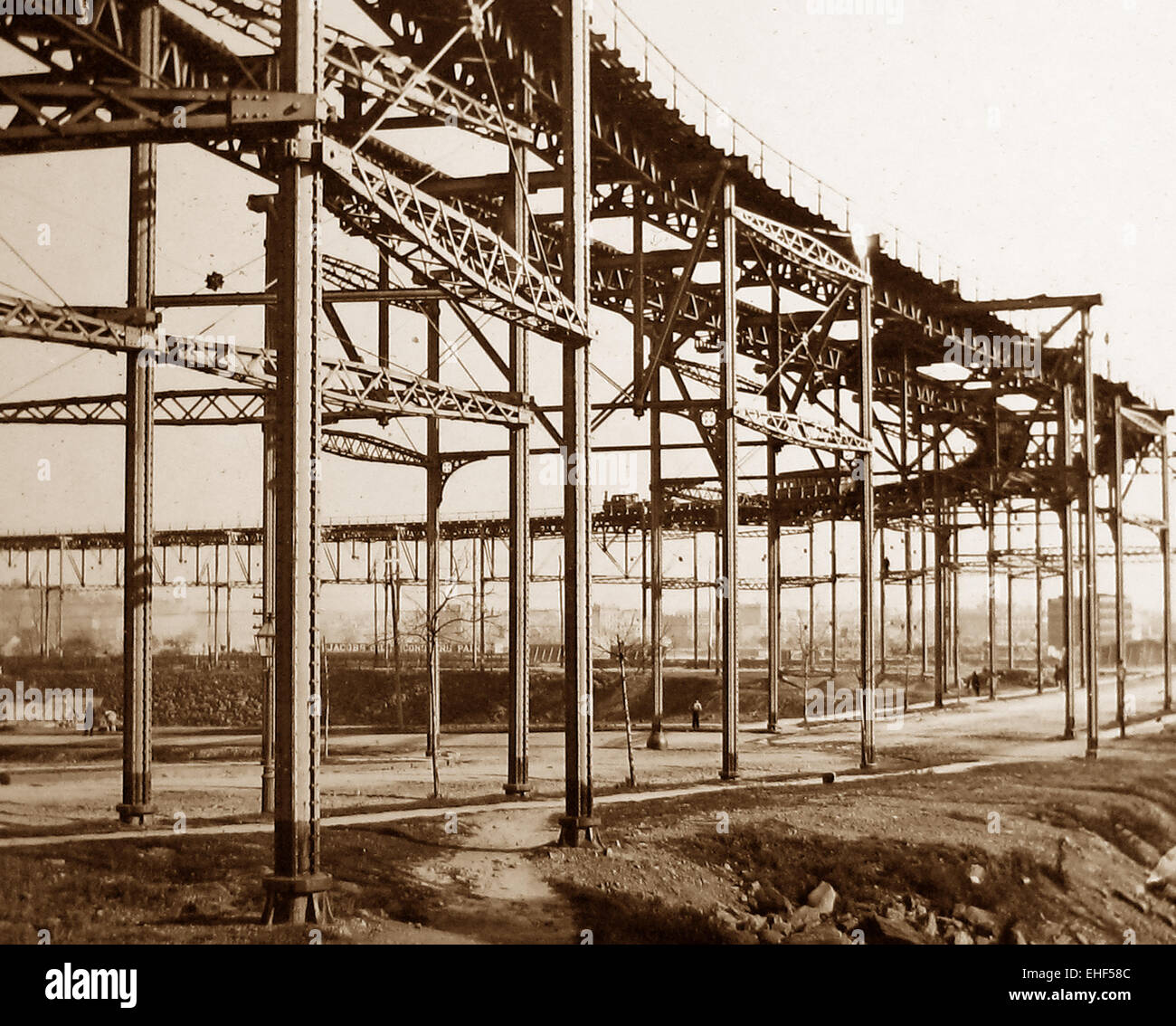 Elevated railway with steam train New York Victorian period Stock Photo ...
