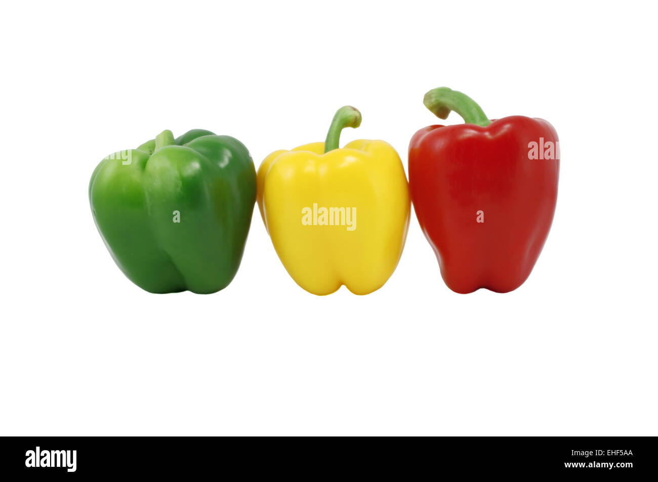 Green, Red And Yellow Capsicum In A Row Stock Photo - Alamy