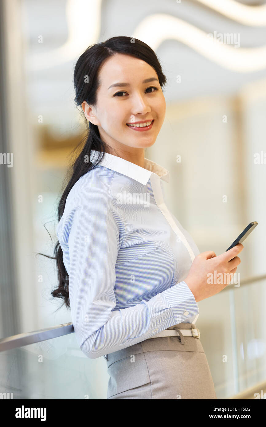 Successful business women are using mobile phones Stock Photo - Alamy