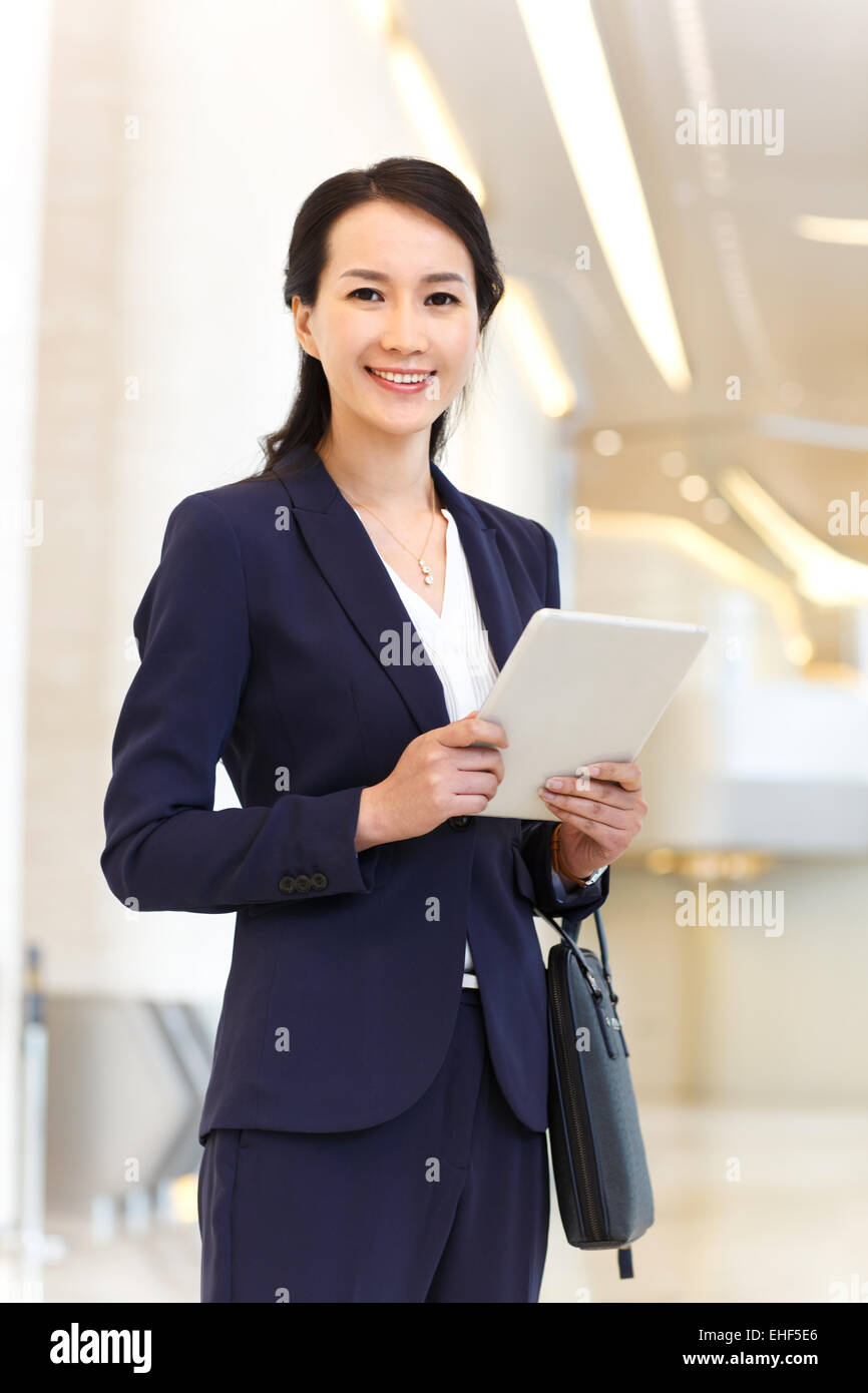 Successful business women use flat computer Stock Photo - Alamy