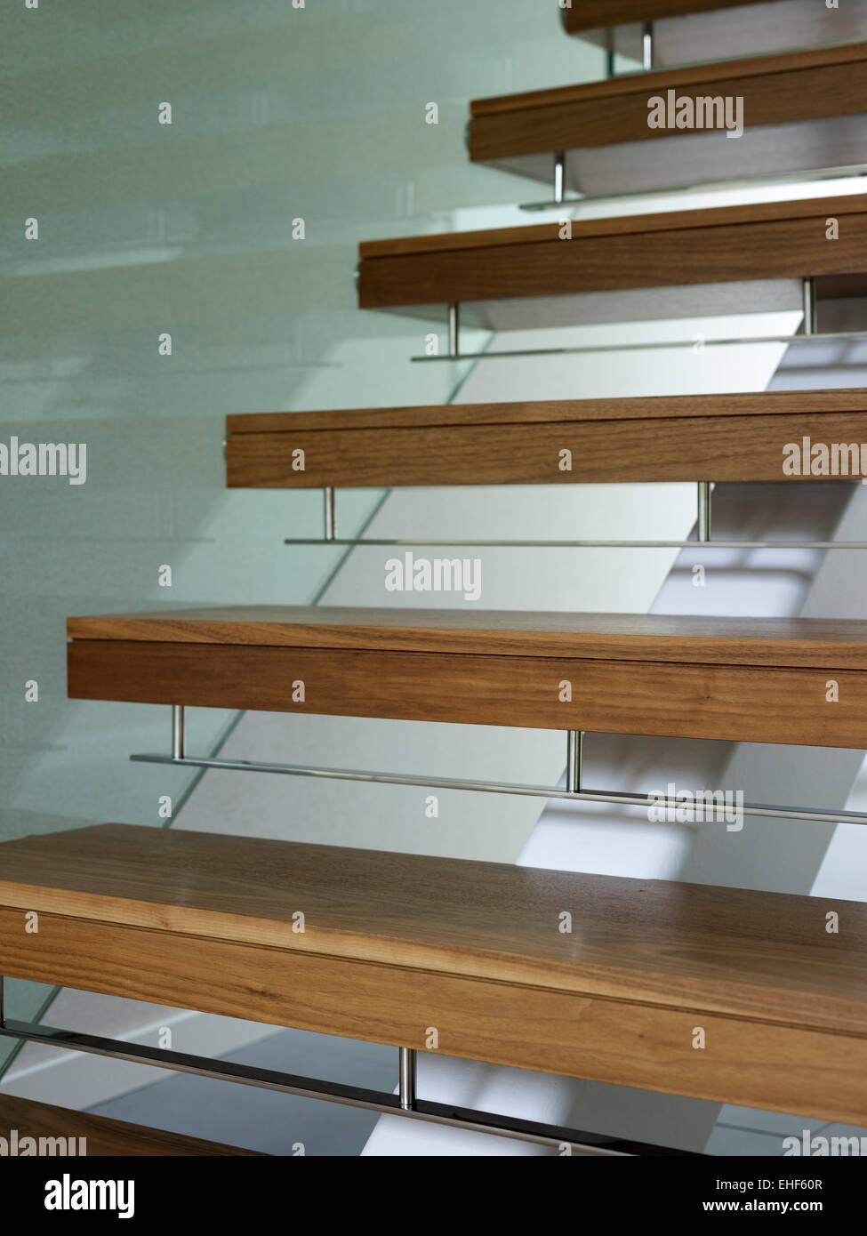 Floating wooden steps with metal fixture detail with Cherry Orchard ...