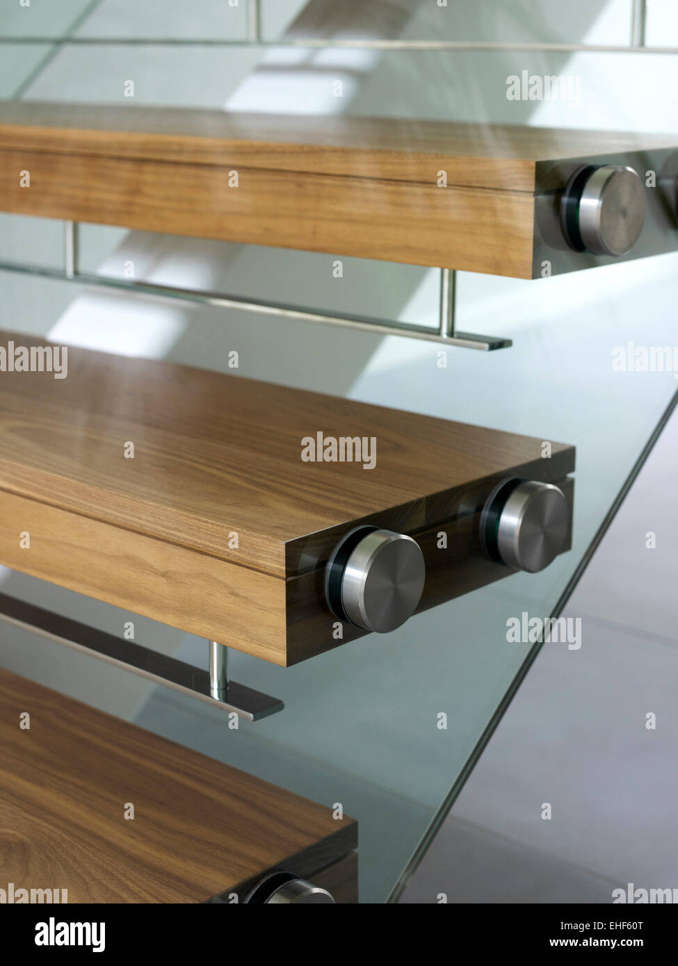 Floating wooden steps with metal fixture detail with Cherry Orchard ...