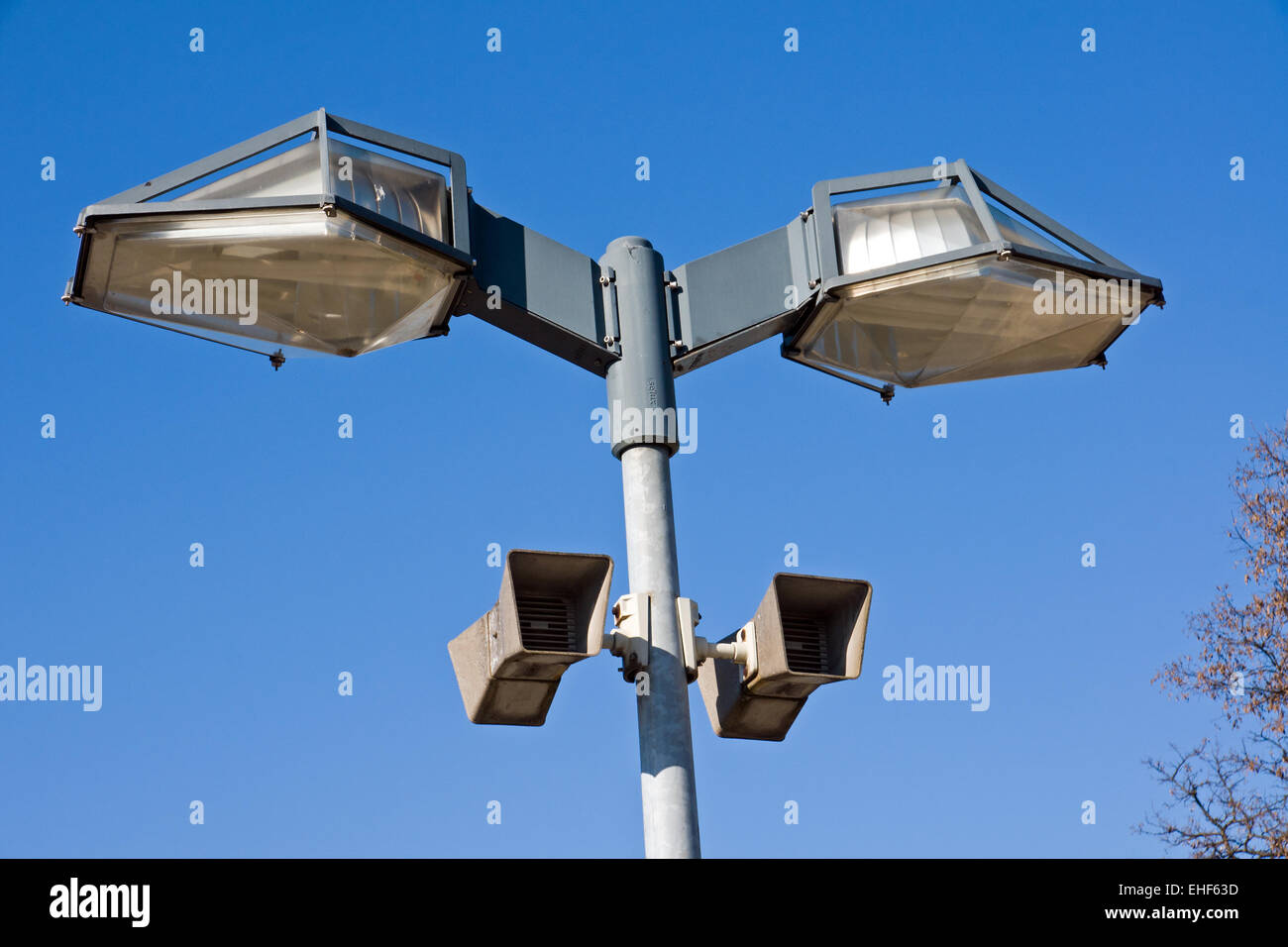 Modern street lights with speakers Stock Photo - Alamy
