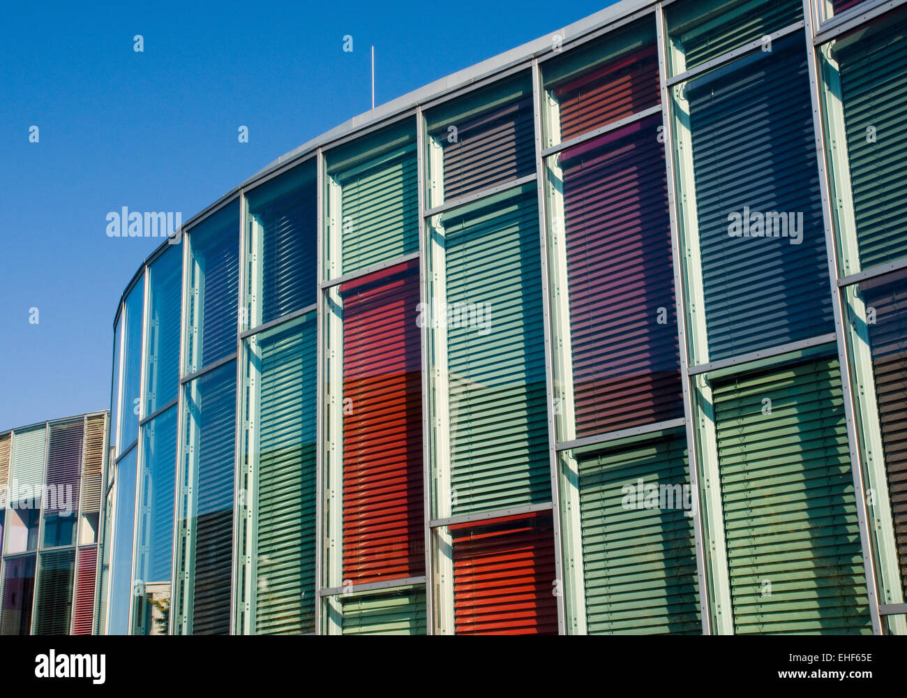 Colourful glass facade Stock Photo - Alamy