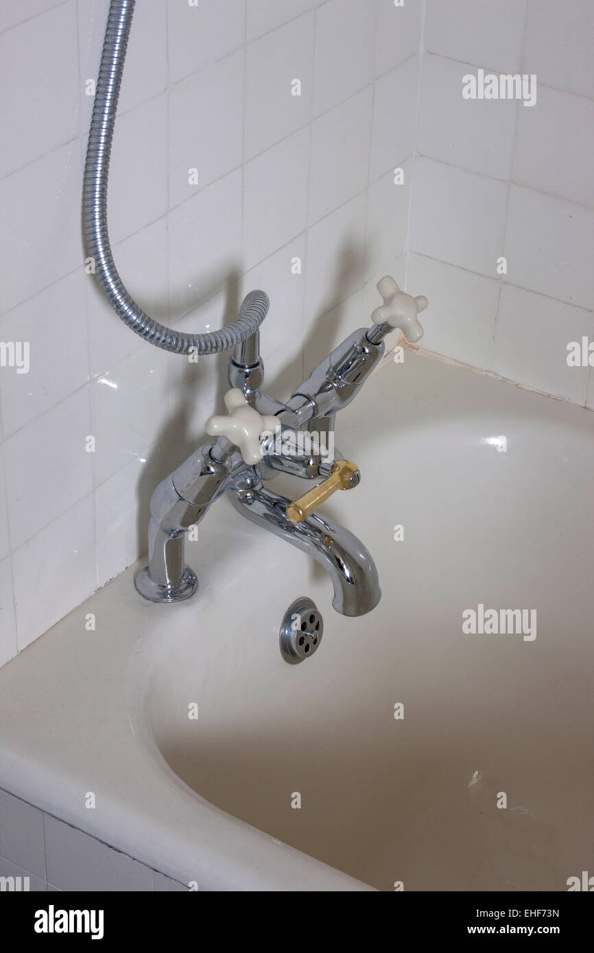 Mixer tap fitting over bath in apartment in Highpoint One, London Stock ... Mixer tap fitting over bath in apartment in Highpoint One, London Stock ...