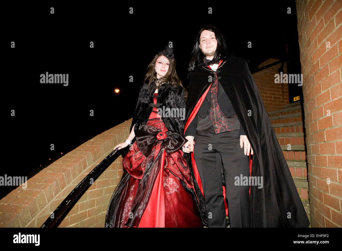 Couple off out for the evening at Whitby Goth Weekender Stock Photo - Alamy