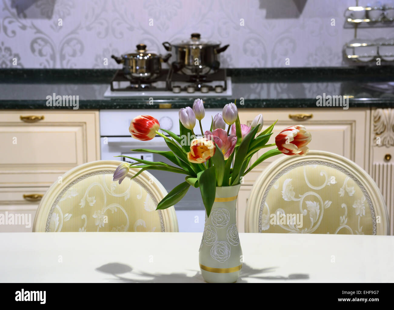 Kitchen interior with flowers Stock Photo - Alamy