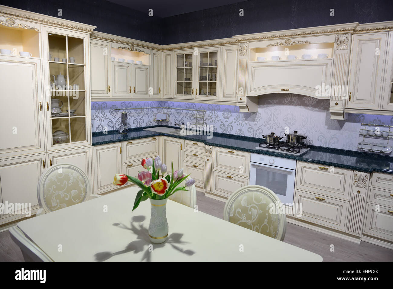 Kitchen interior with flowers Stock Photo - Alamy