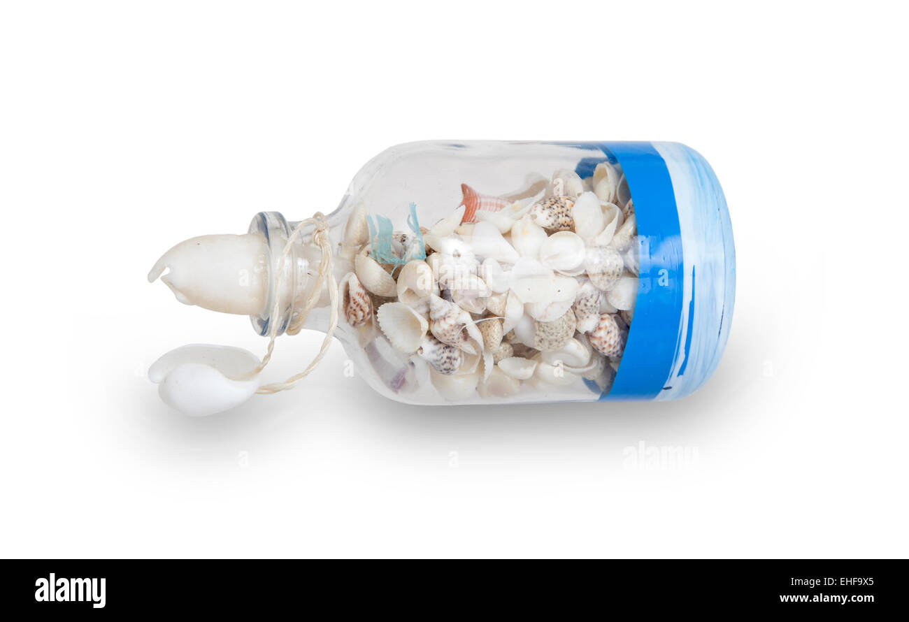 Glass bottle filled with sea shells, isolated on white Stock Photo - Alamy