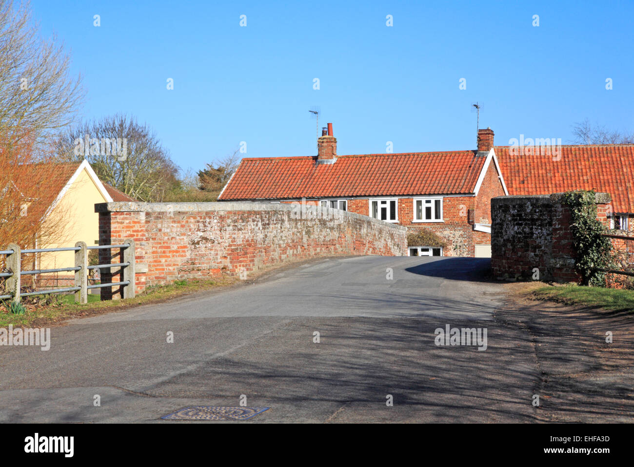 An old narrow bridge in the village of Bawburgh, Norfolk, England ...