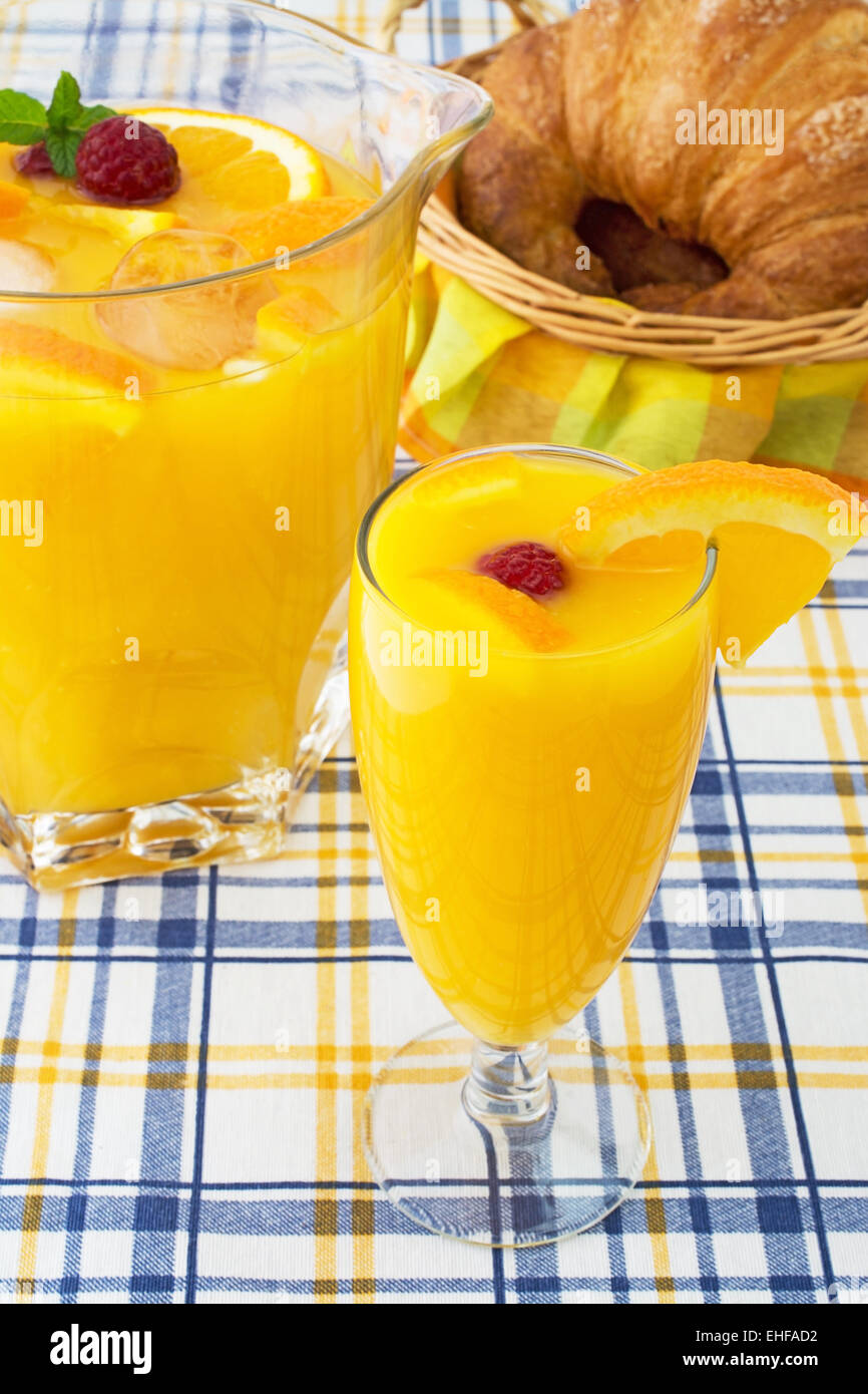 Breakfast with orange juice and fresh croissants Stock Photo - Alamy