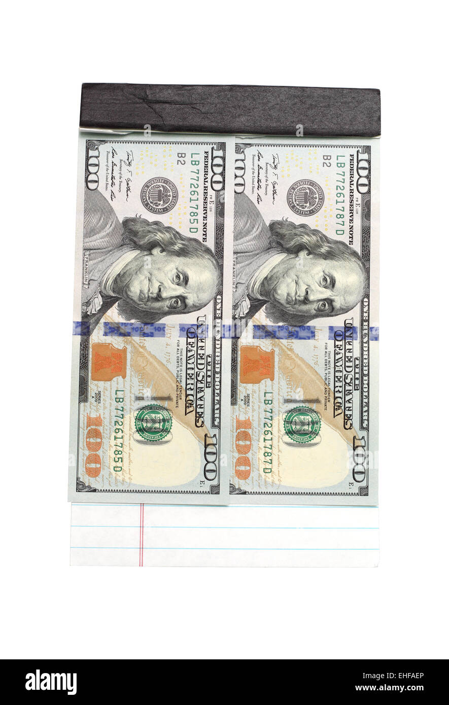 notepad and dollar bills on a white background Stock Photo - Alamy