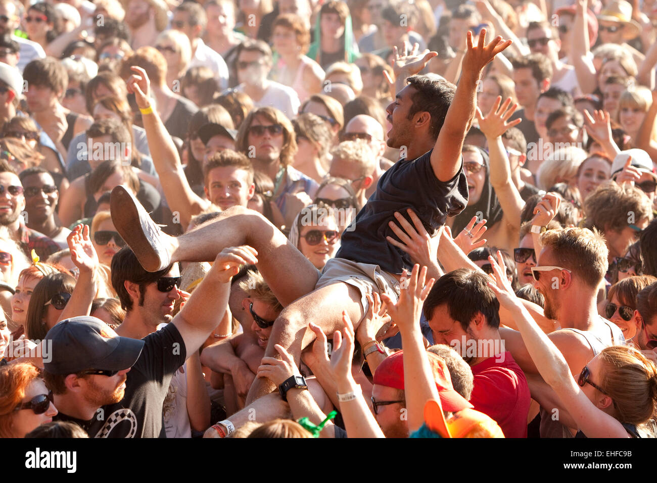 Guy crowd surfing at Lovebox festival in Victoria Park London July 2010 ...