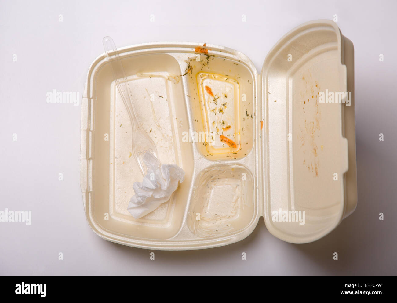 Empty takeout food box with scraps left over from eating Stock Photo ...
