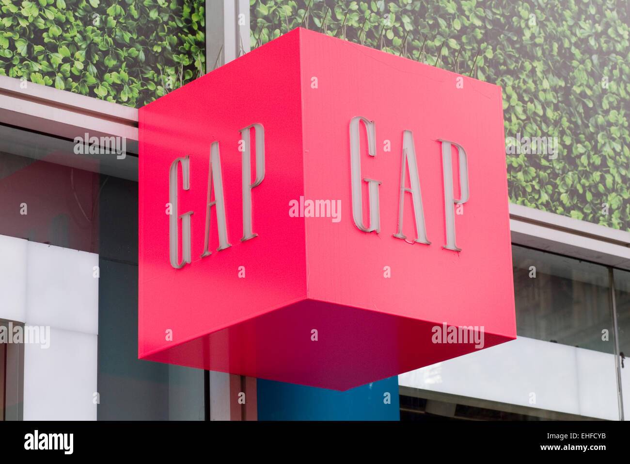 Pink cubed Outdoor Gap Sign on the High Street in London England Stock ...