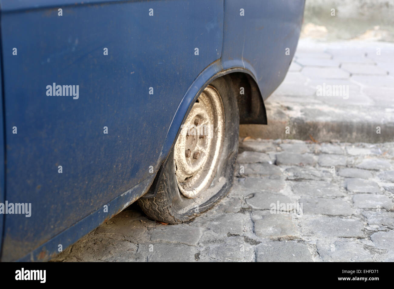 punched a car wheel Stock Photo - Alamy