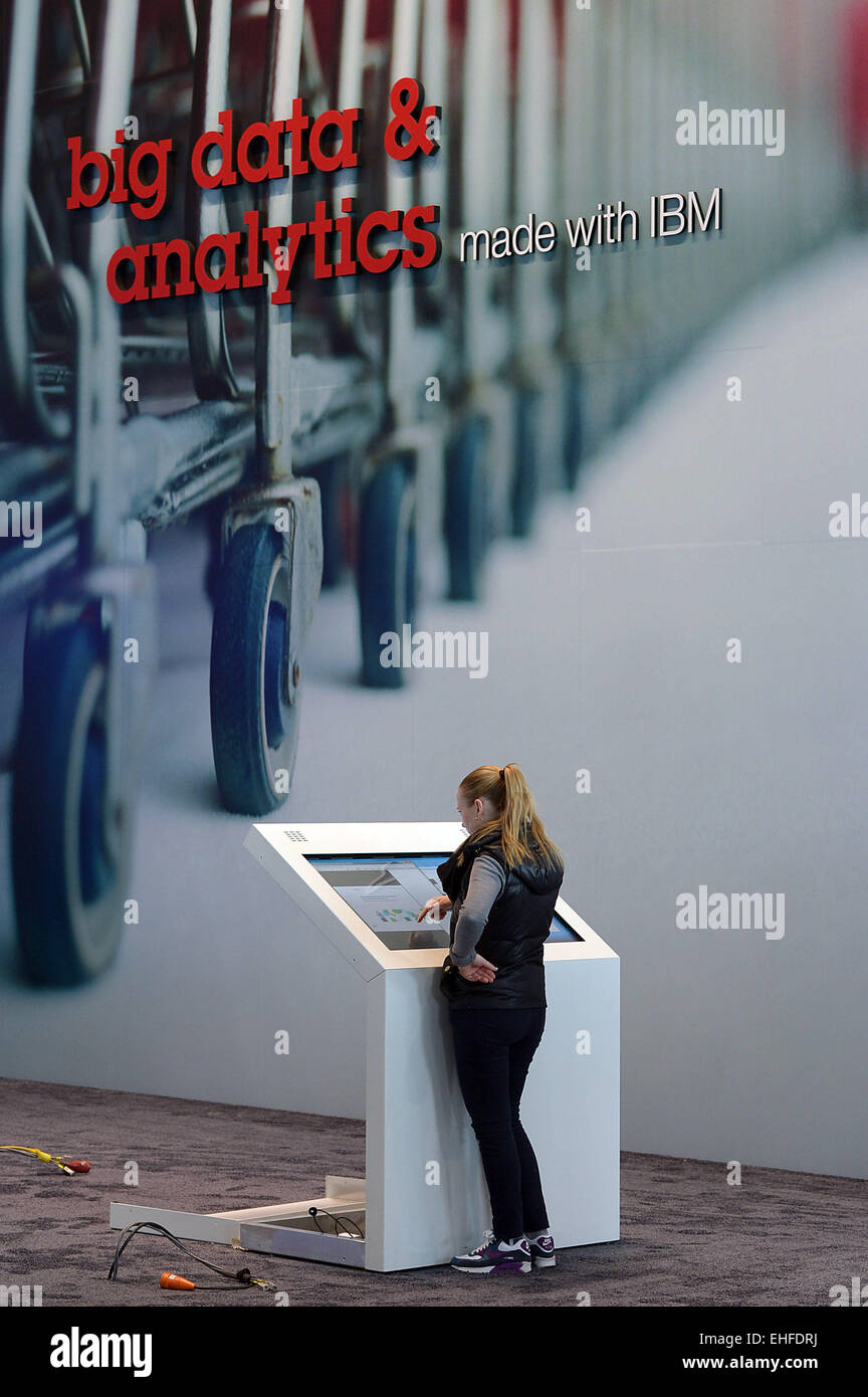 Hanover, Germany. 13th Mar, 2015. A technician works at the IBM booth ...