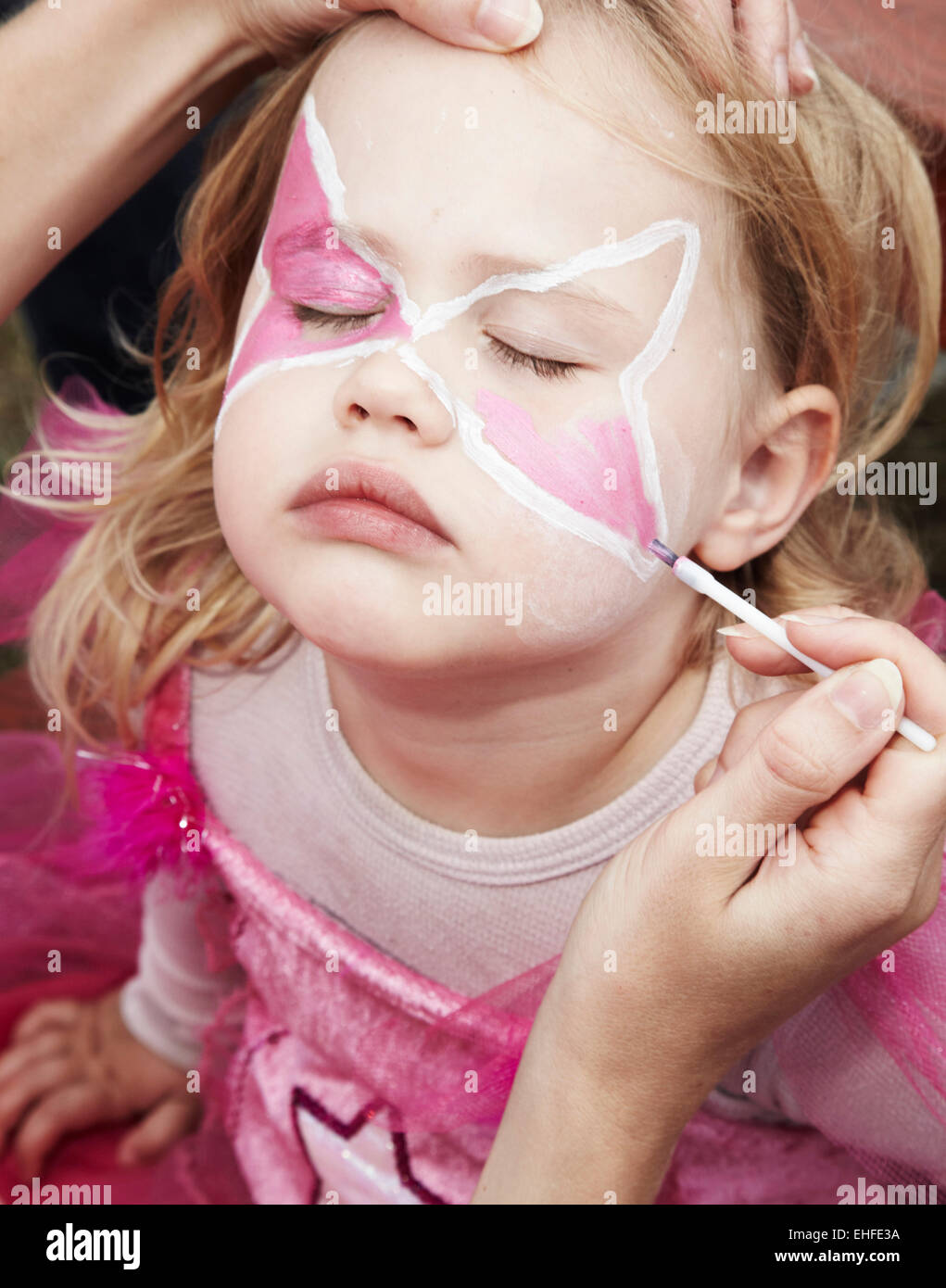 Girl getting face painted at Camp Bestival Lulworth Castle Dorset ...