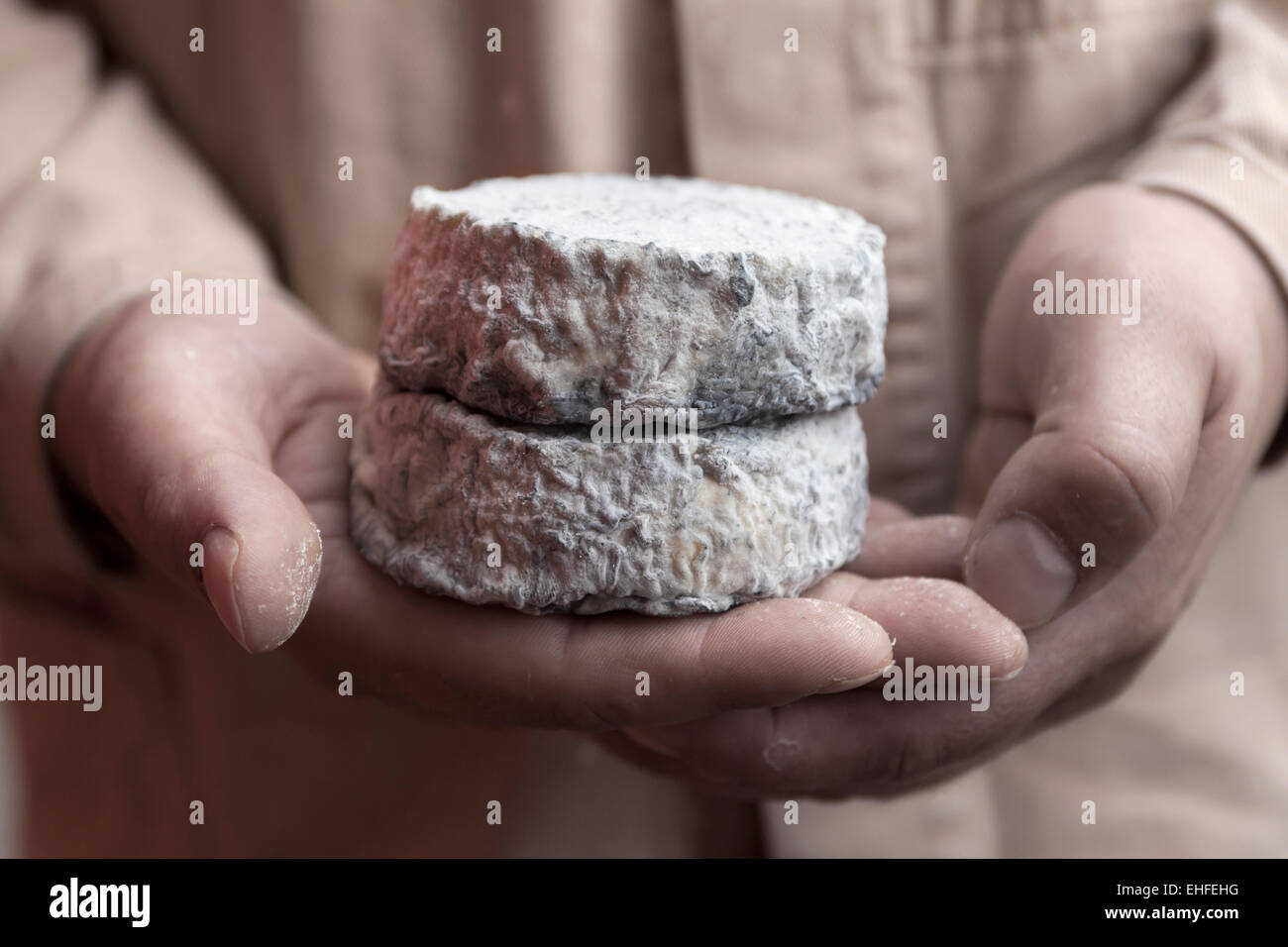 Man holding cheese at Mons Cheesemongers London Stock Photo - Alamy