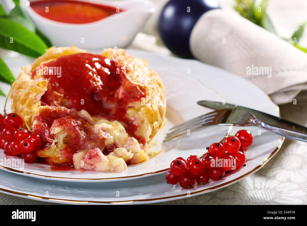 Cheese baked in puff pastry Stock Photo - Alamy