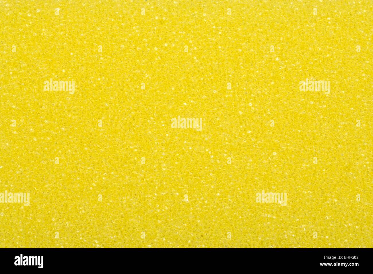 Yellow sponge, a background or texture Stock Photo - Alamy