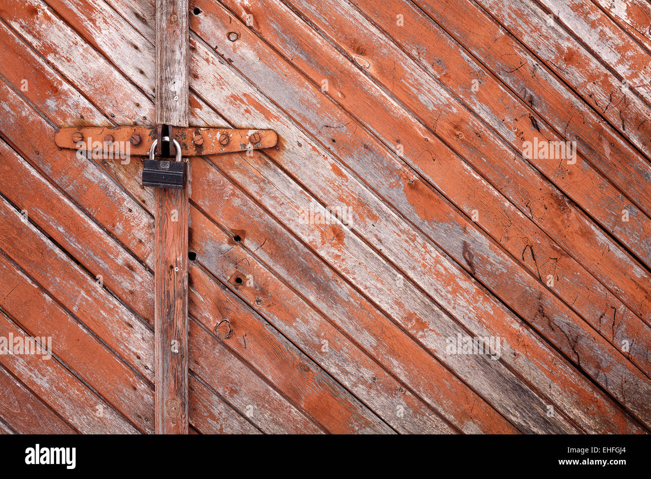 Grunge wood plank door with padlock Stock Photo - Alamy