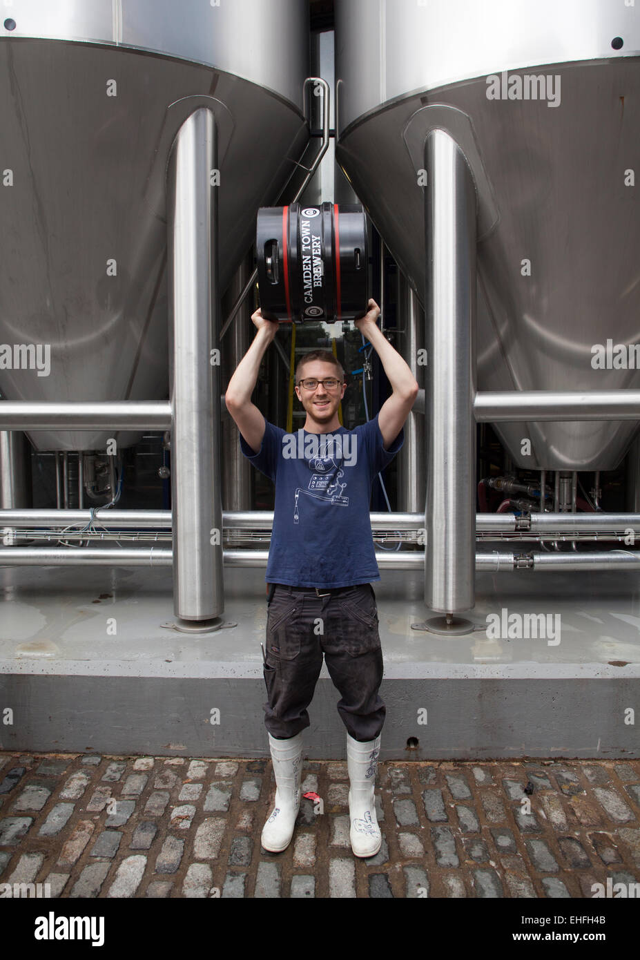 Staff Member Holding Beer Barrel at the Camden Town Brewery London ...