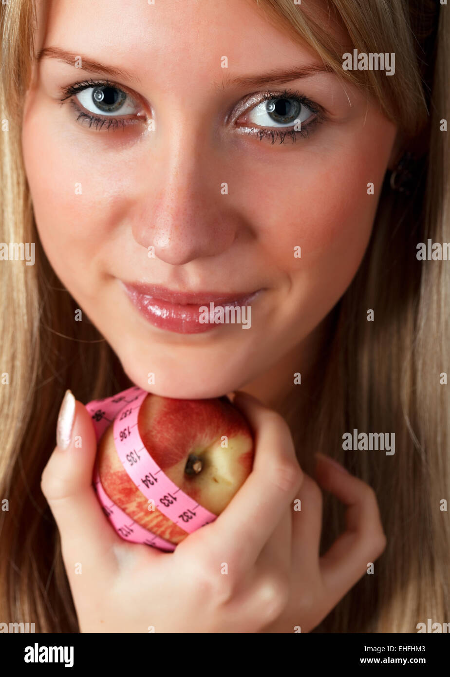Girl with peach Stock Photo - Alamy