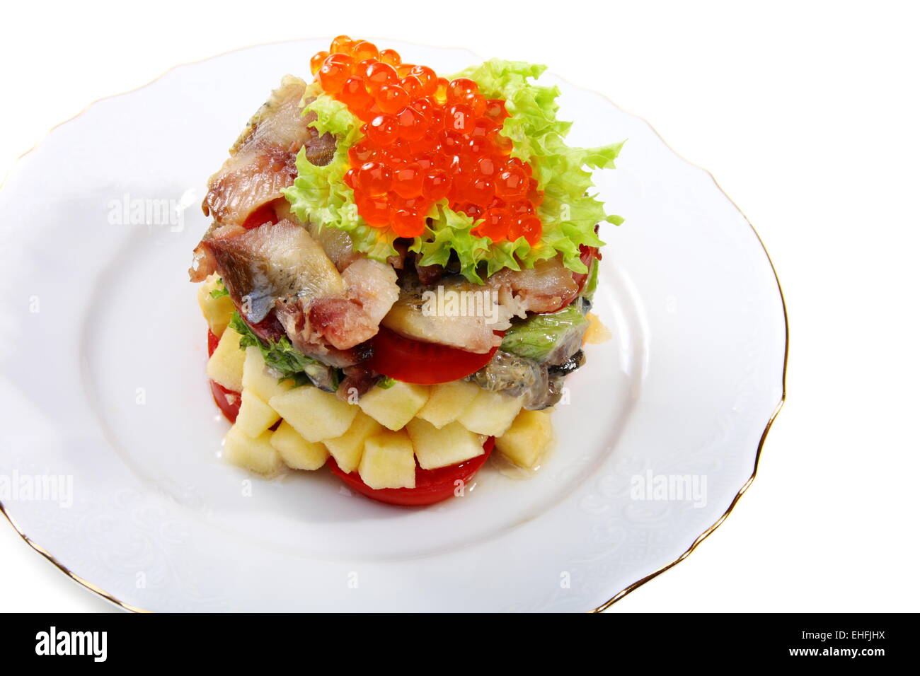 Salad with smoked herring and salmon roe Stock Photo - Alamy
