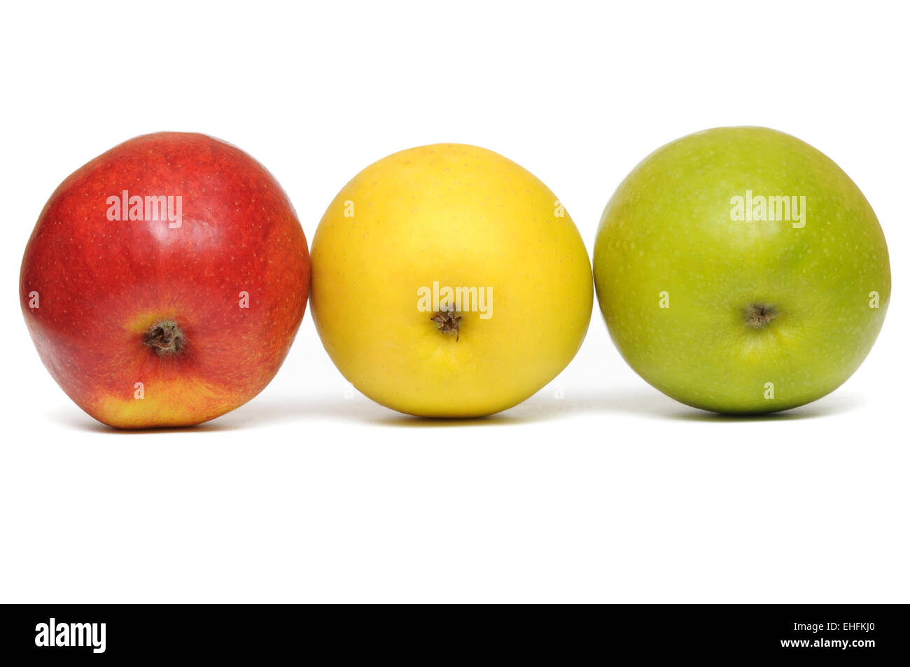 Yellow, green and red apples on white background Stock Photo - Alamy