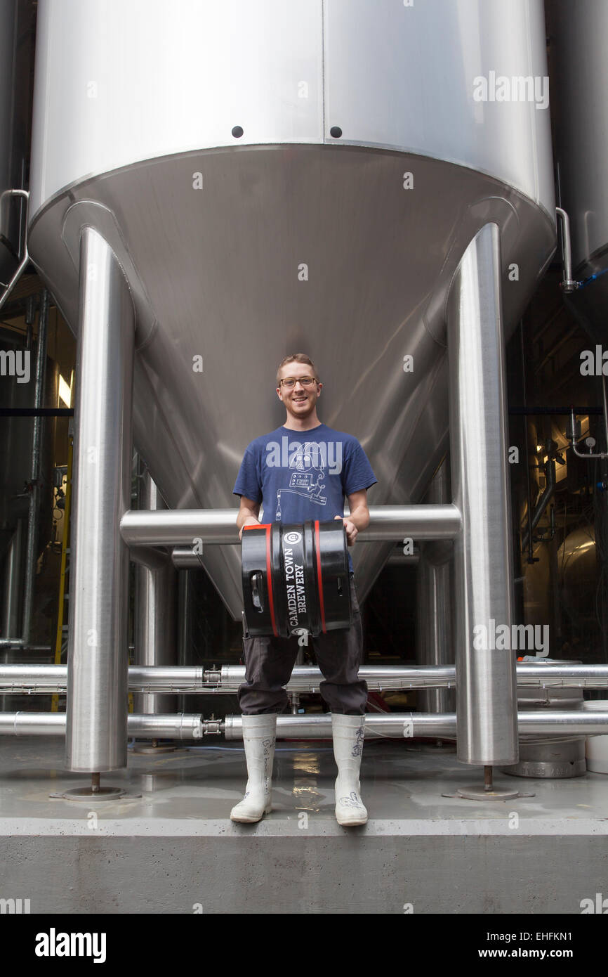 Staff Member Holding Beer Barrel at the Camden Town Brewery London ...
