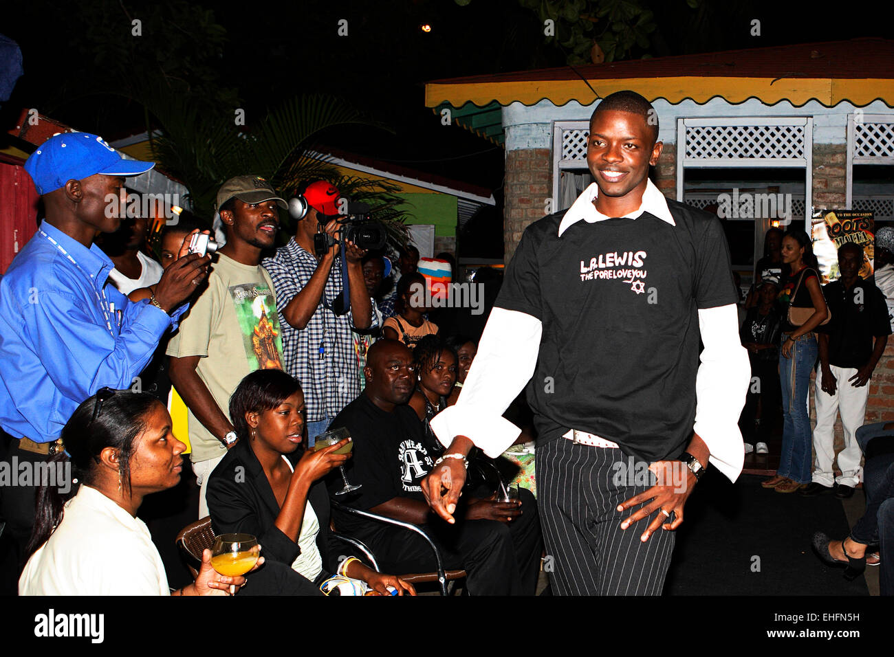 Model wearing an LA Lewis T-Shirt in Kingston Jamaica Stock Photo - Alamy