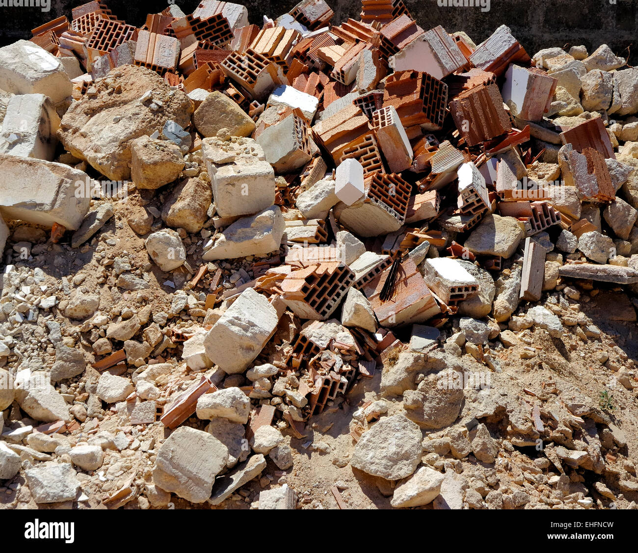 A pile of dirt and busted-up rubble at a construction site Stock Photo ...