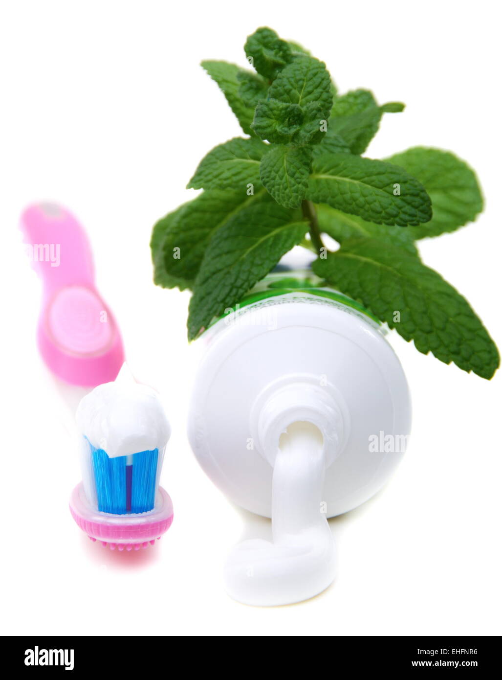 Toothbrush and paste mint Stock Photo - Alamy