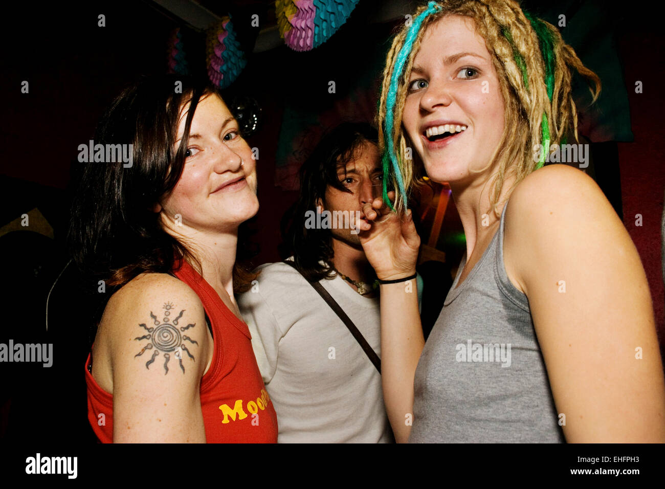 Cool girls dancing at a squat party London Stock Photo - Alamy