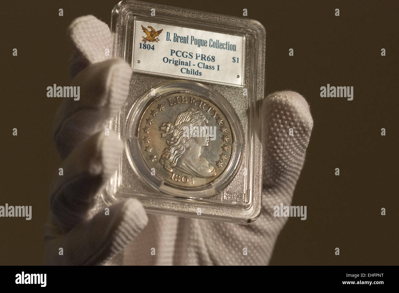Historical dollar coin stacks hi-res stock photography and images - Alamy