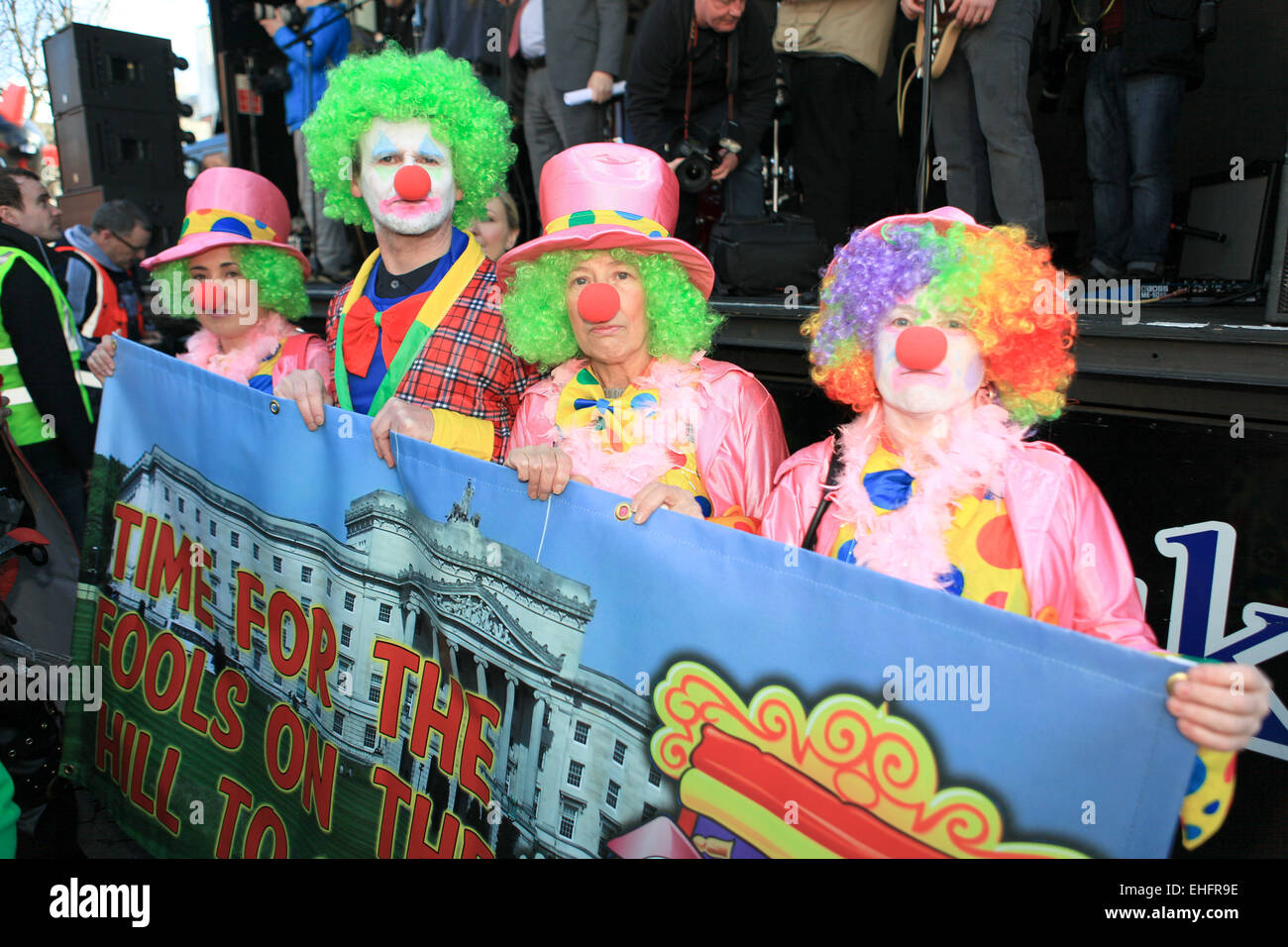 Belfast, UK. 13th March, 2015. People dressed as clowns at the Trade ...